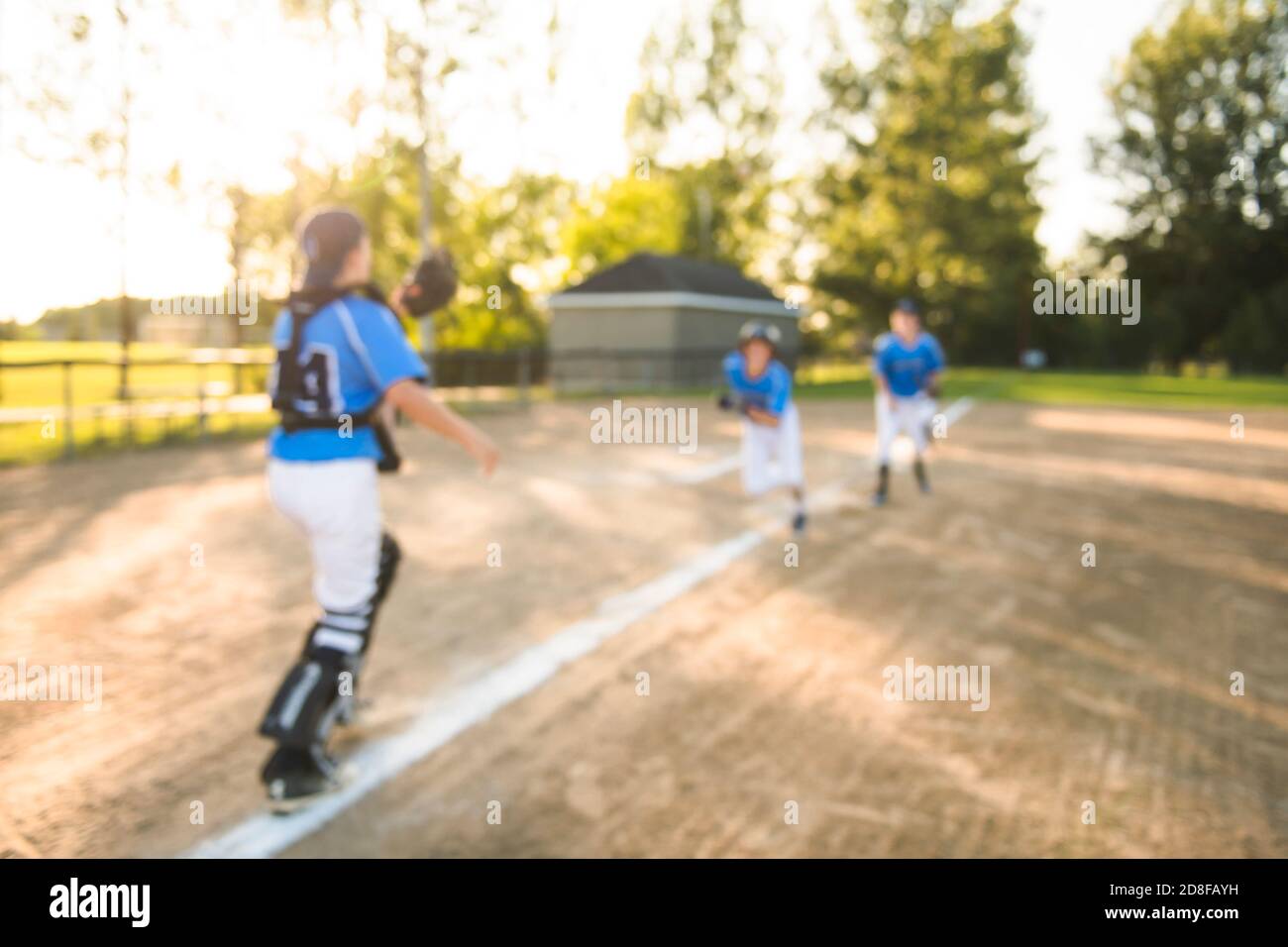 blurred Group of baseball players play together on the playground Stock ...