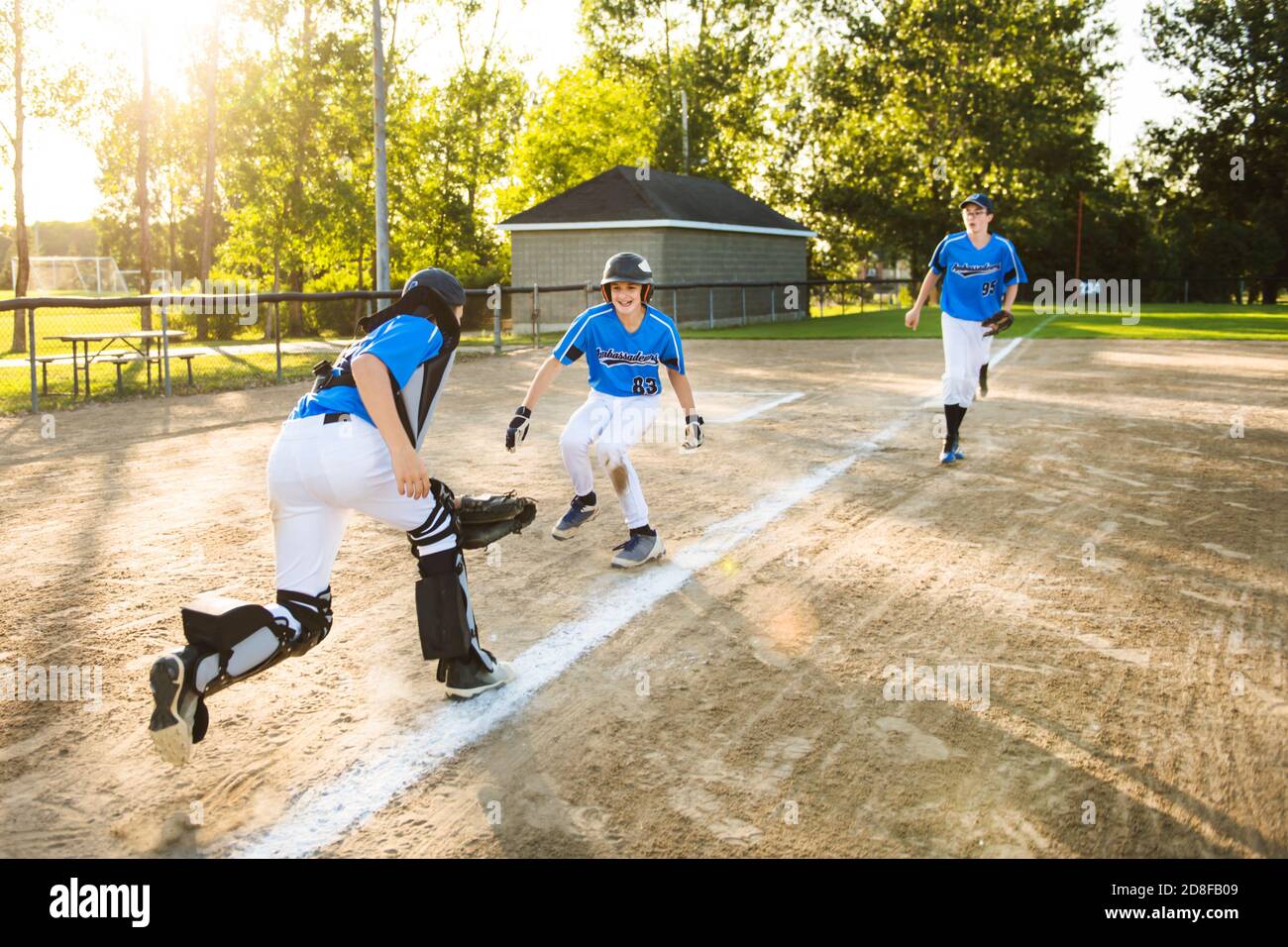Group of baseball players play together on the playground Stock Photo ...