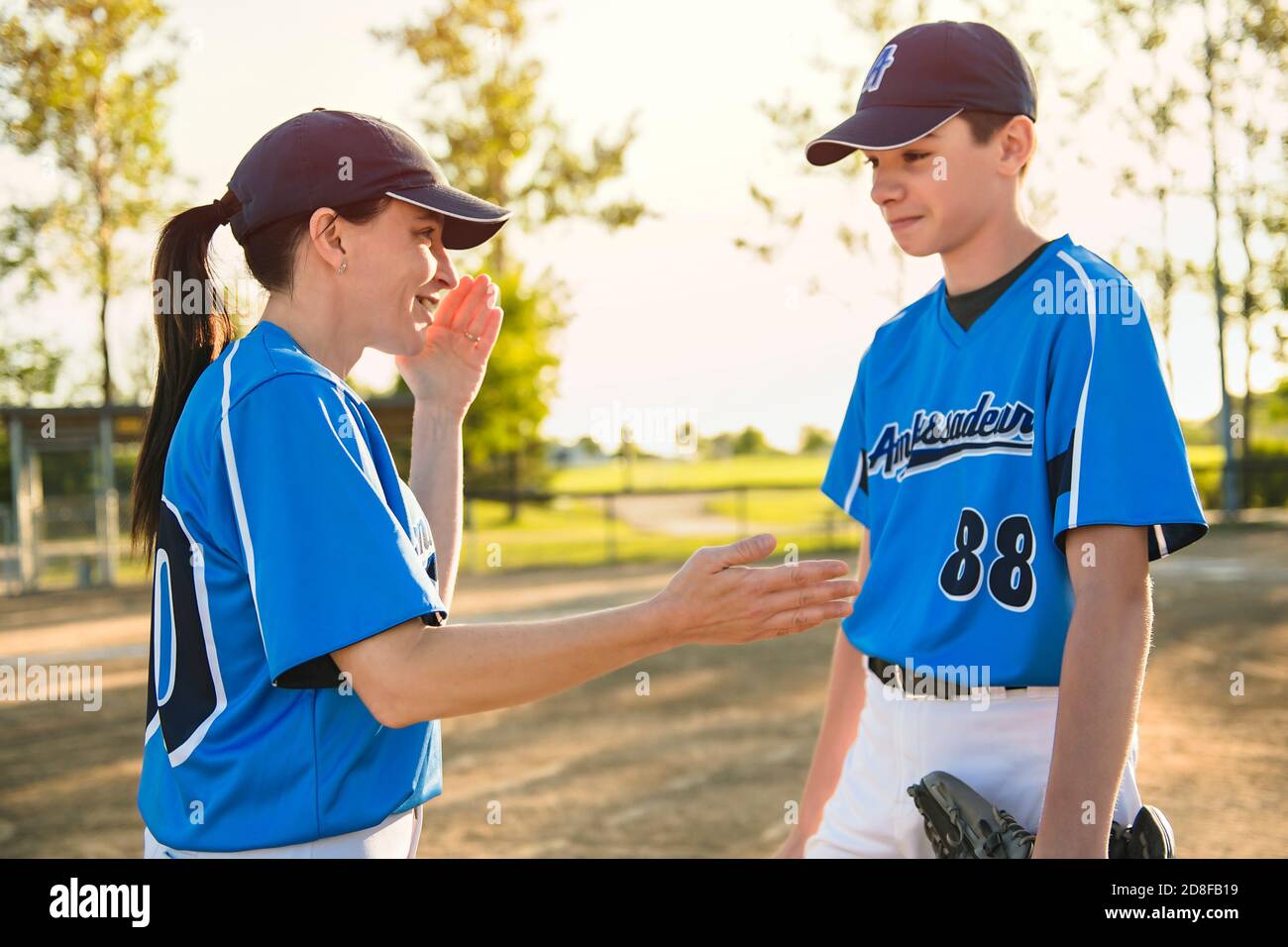 Male coach kids hi-res stock photography and images - Alamy