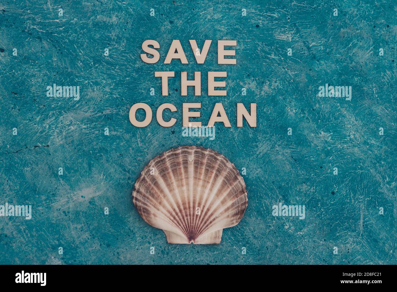 act for climate change and global warming, save the ocean text on blue ...