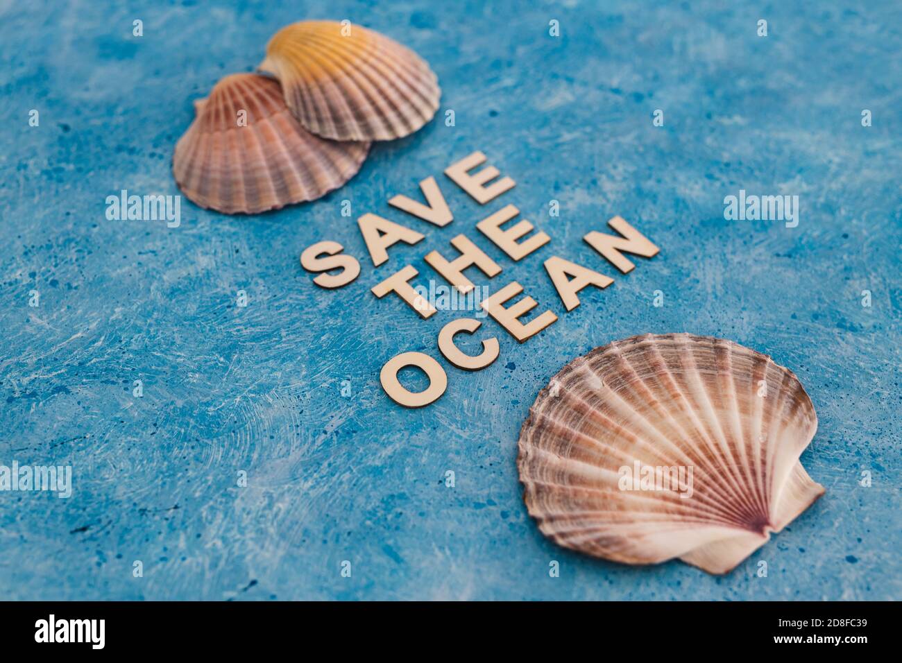 act for climate change and global warming, save the ocean text on blue ...