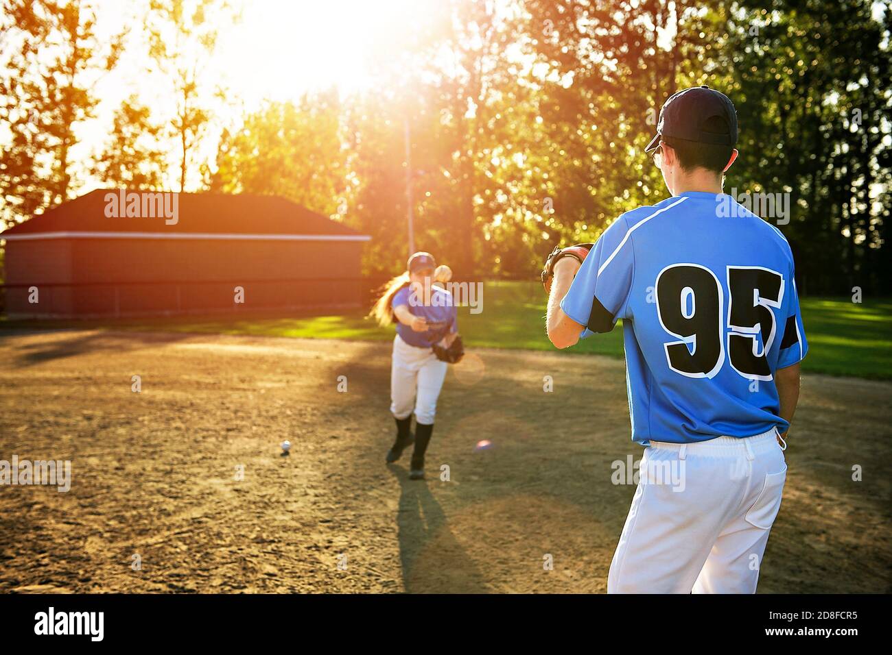Group of baseball players play together on the playground Stock Photo ...