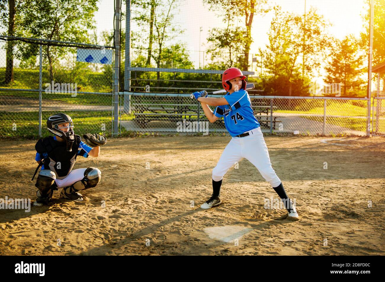 Group of baseball players play together on the playground Stock Photo ...
