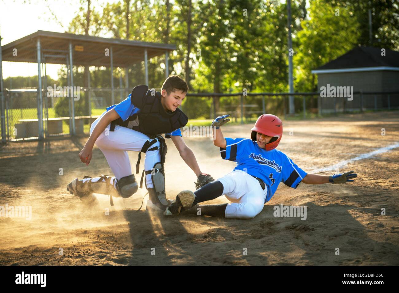 Group of baseball players play together on the playground Stock Photo ...