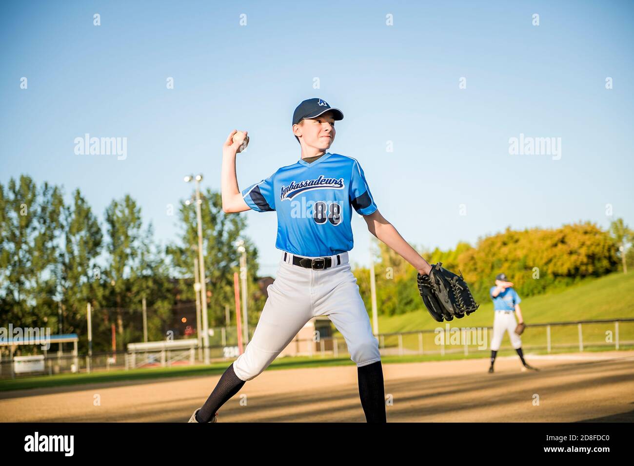 baseball pitcher players standing on the playground Stock Photo - Alamy