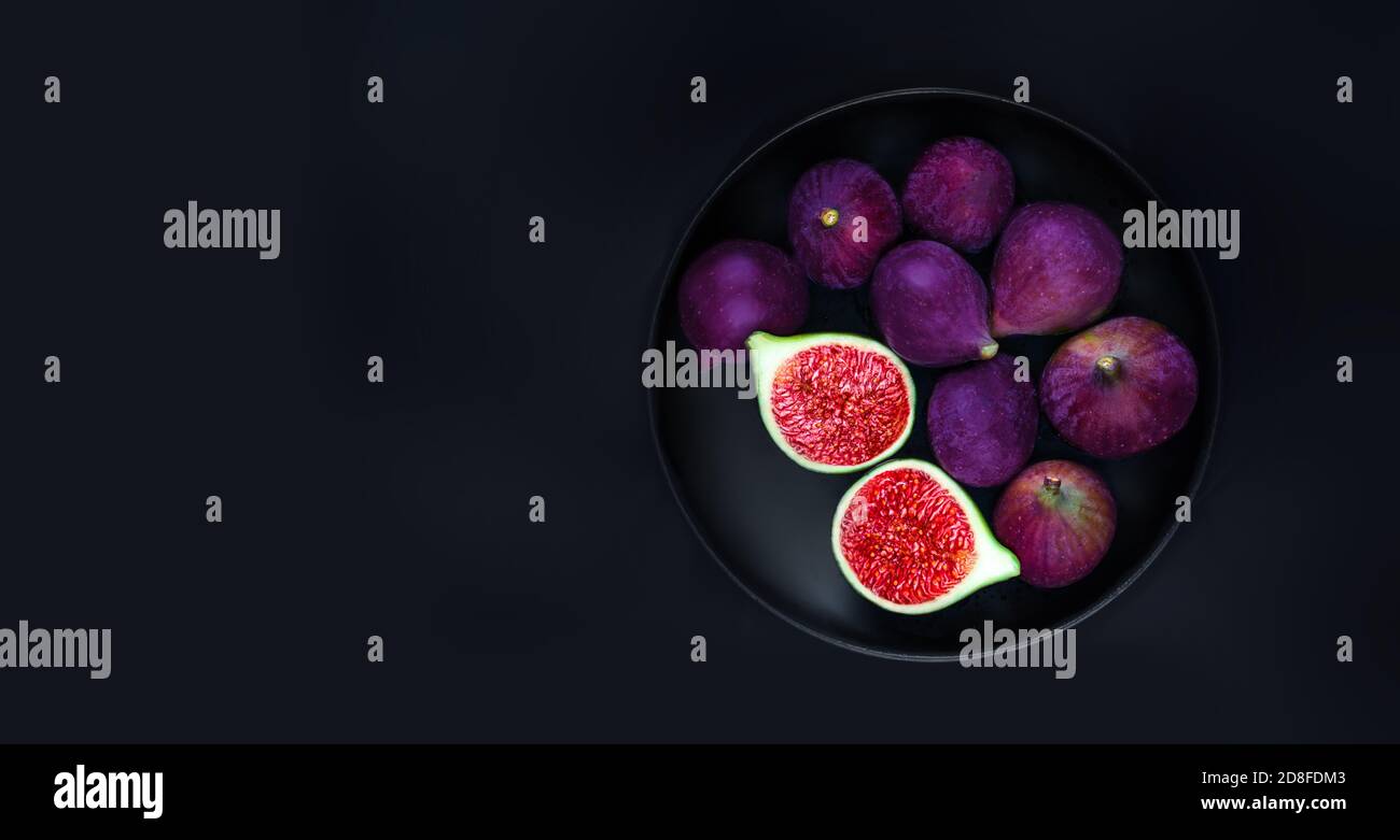 Fresh ripe figs on dark Background. Beautiful blue violet figs with ...