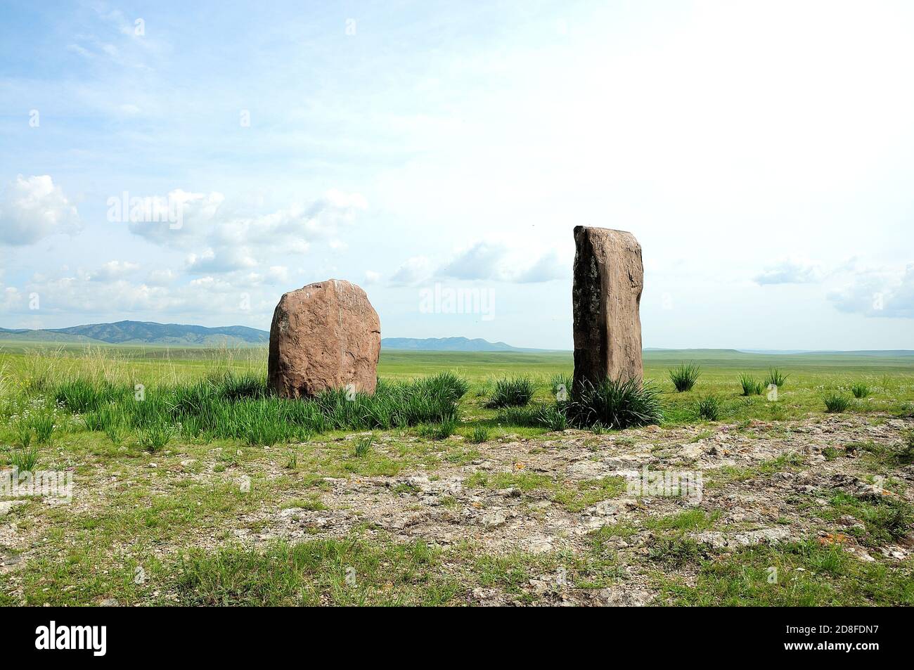 Two ancient sacral stones set in the endless steppe. Gateway to the ...