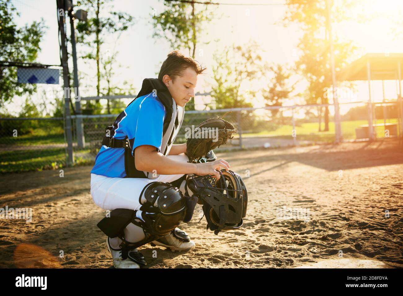 A children baseball catcher players standing on the playground Stock ...
