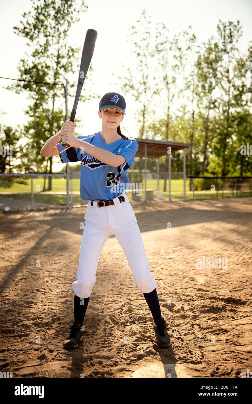 Girl baseball bat hi-res stock photography and images - Alamy