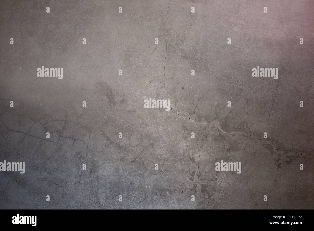 Closeup of a smooth cement wall texture with cracks and color ...