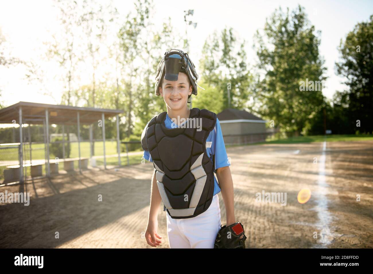 A children baseball catcher players standing on the playground Stock ...