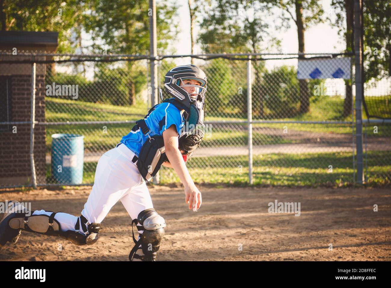 A children baseball catcher players standing on the playground Stock ...
