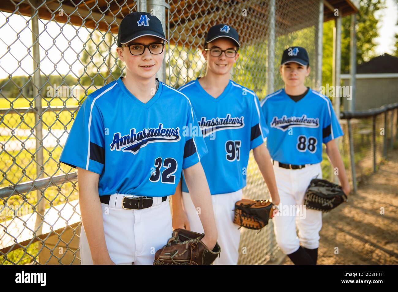 Group of baseball players standing together on the playground Stock ...