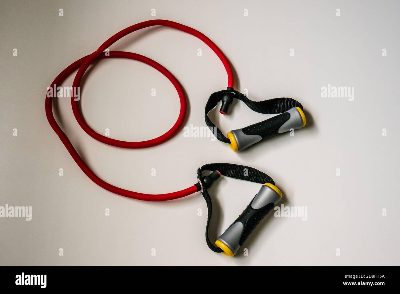 resistance band with handles Stock Photo - Alamy