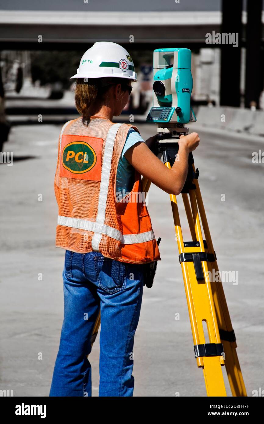 Female Surveyor working on Freeway # 4 connector, Downtown Orlando ...