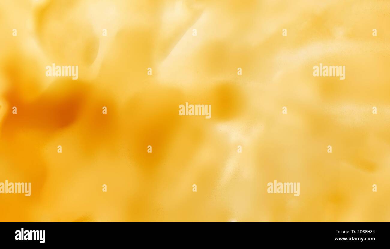 Abstract Sweet Caramel sauce background. Liquid melted caramel or maple ...