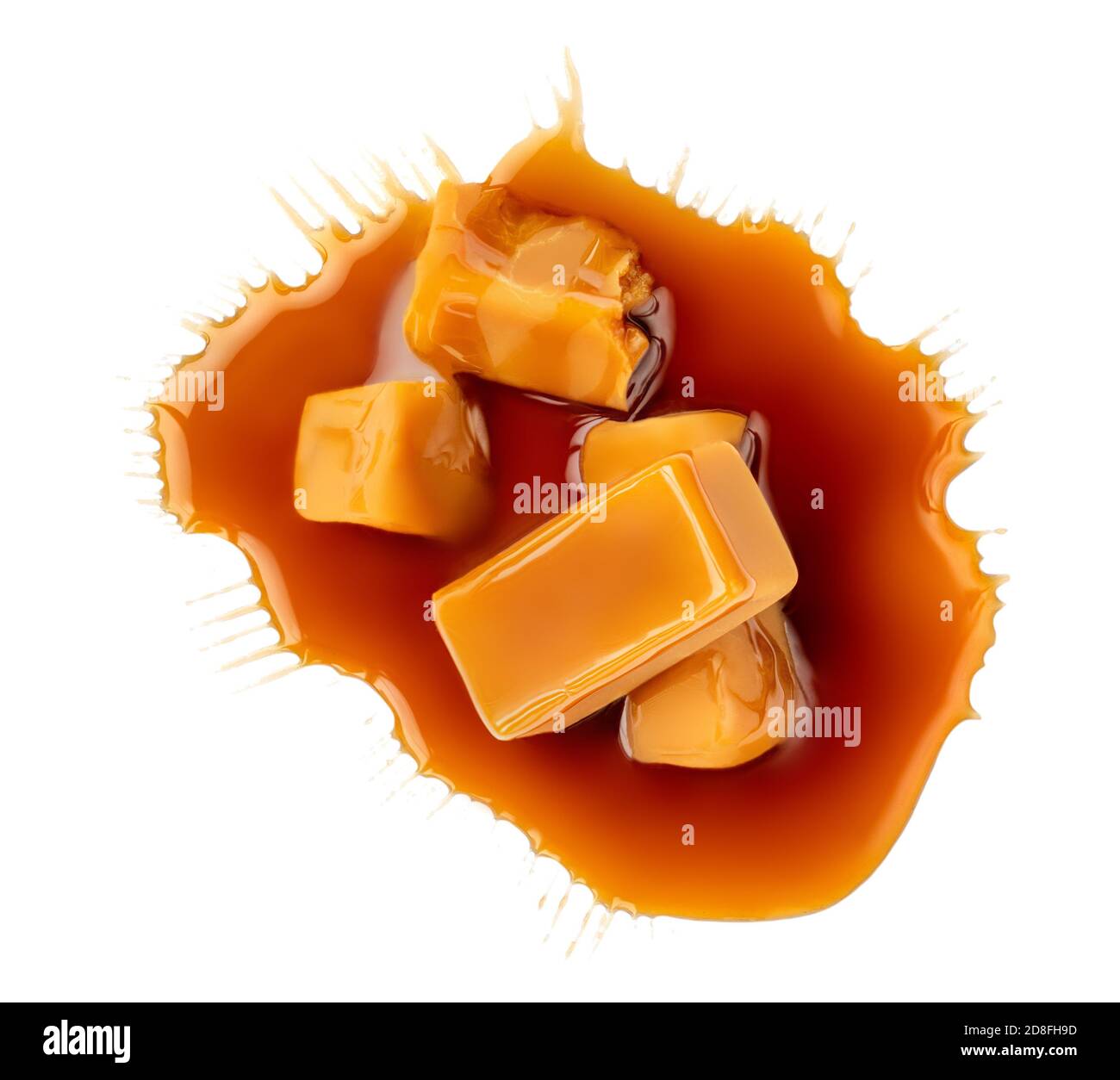 Soft caramel isolated on a white background. Salted melted toffee candy ...