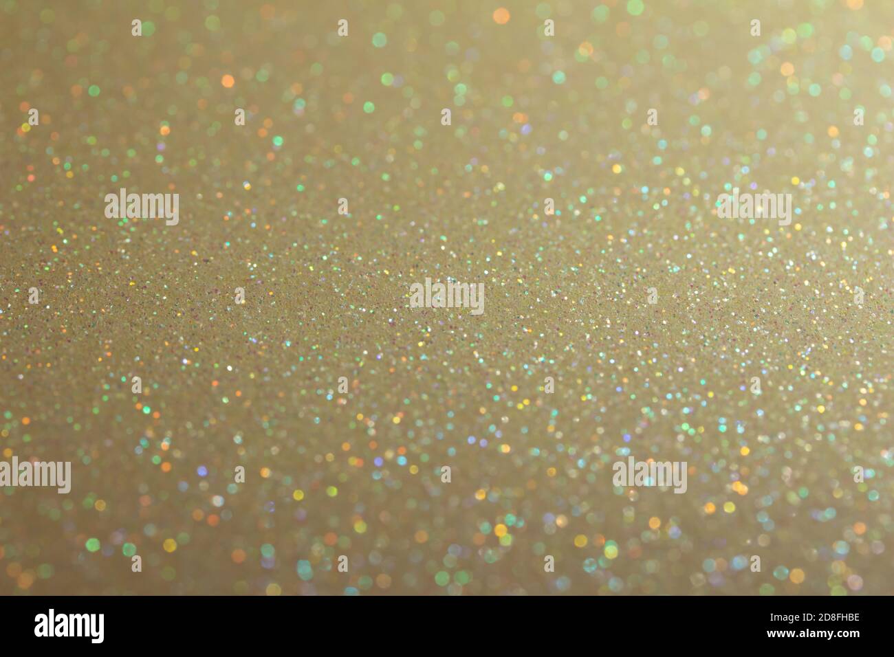 Full frame macro abstract background of sparkling golden beige color ...
