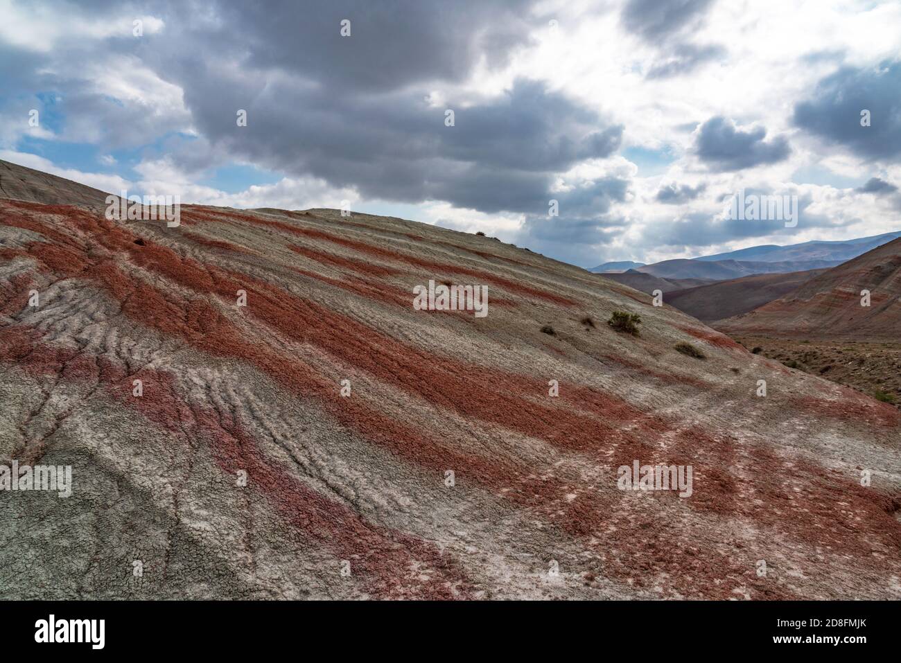 Striped red mountains landscape, beauty of nature Stock Photo - Alamy