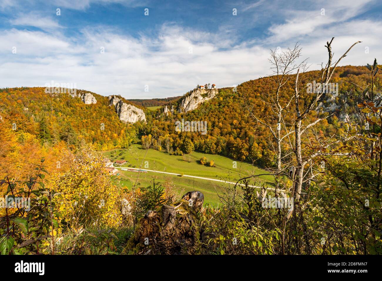 Colorful view of Bronnen Castle on the hiking trail in autumn in the ...