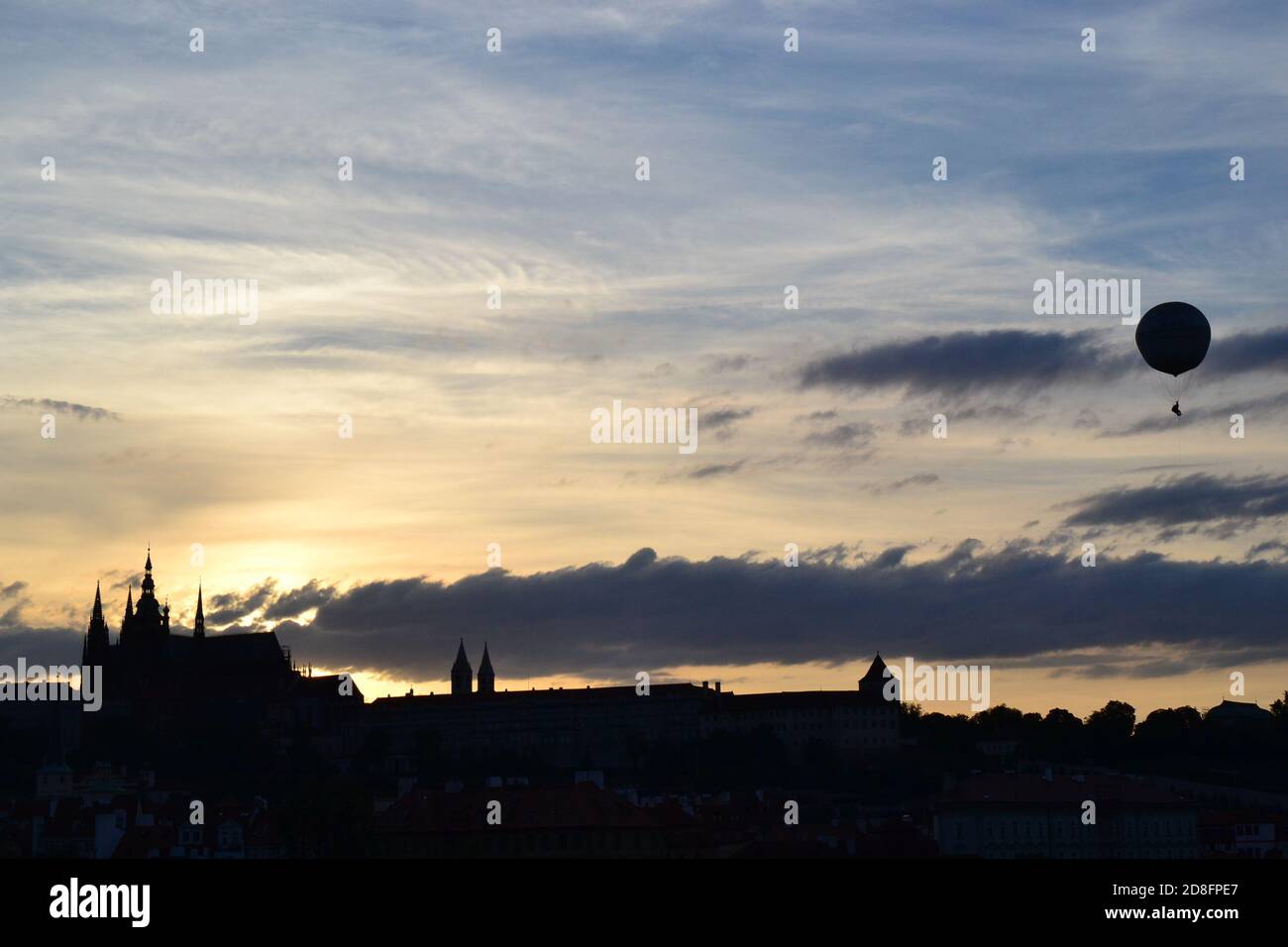 Sun goes off in the Prague. Sunset in Prague. Sky with sunshine and ...