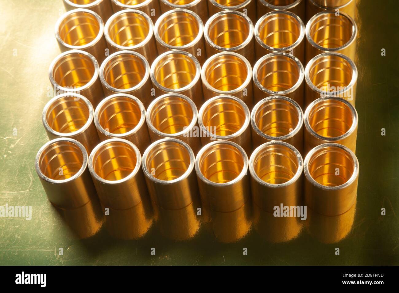 Engineering and metalworking technologies. New brass cylinders Stock ...