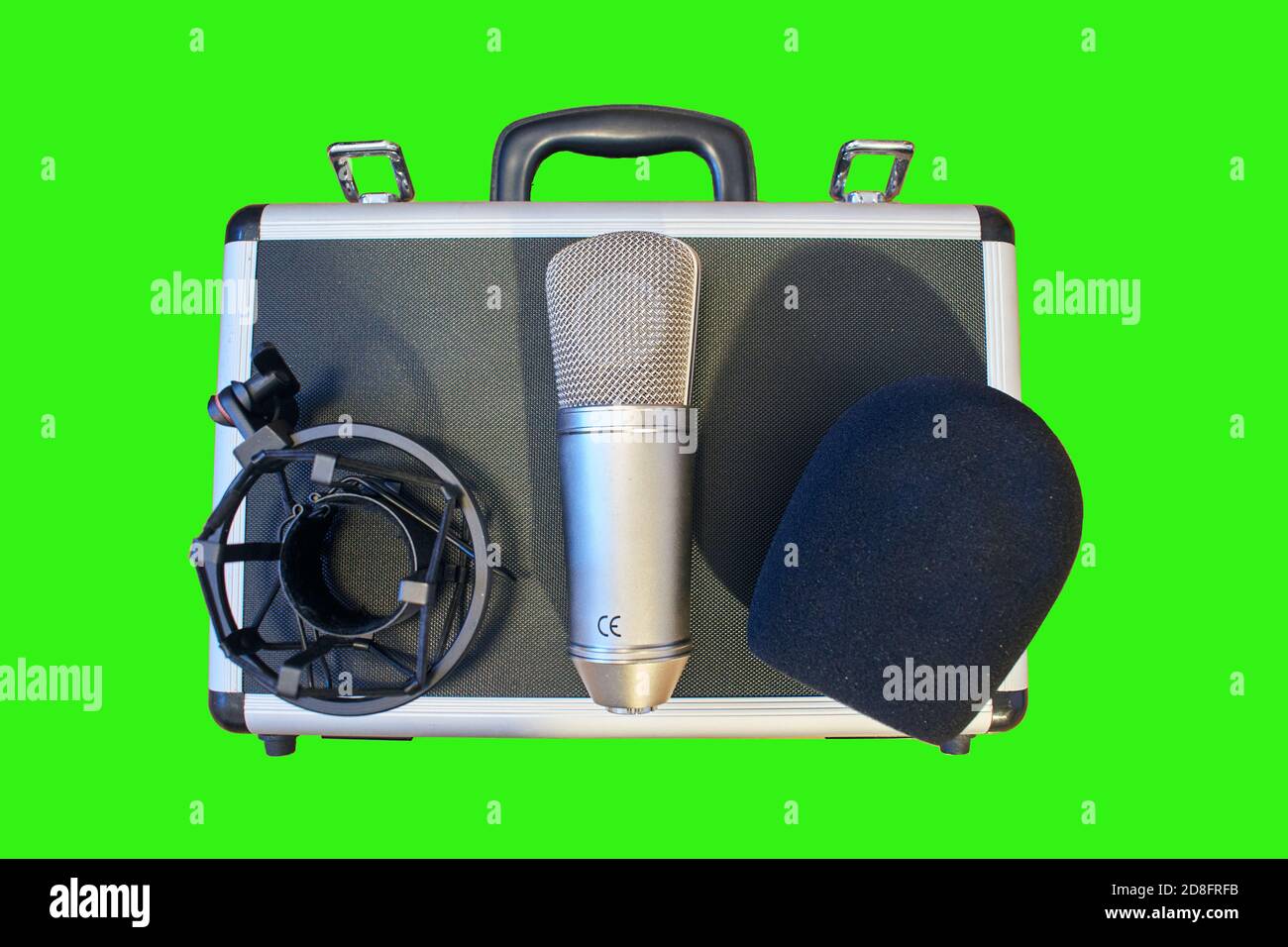 Isolated top view of a box with a condenser microphone set on top of it ...