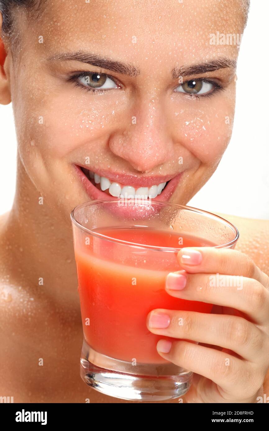 beautiful model with wet body and fruit juice Stock Photo - Alamy