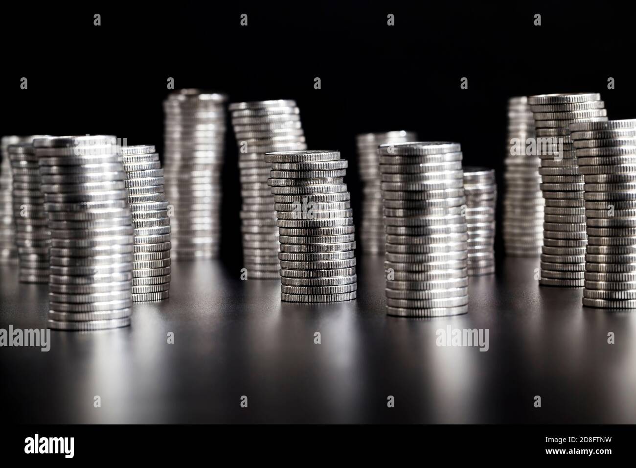 coins of silver color stacked together Stock Photo - Alamy