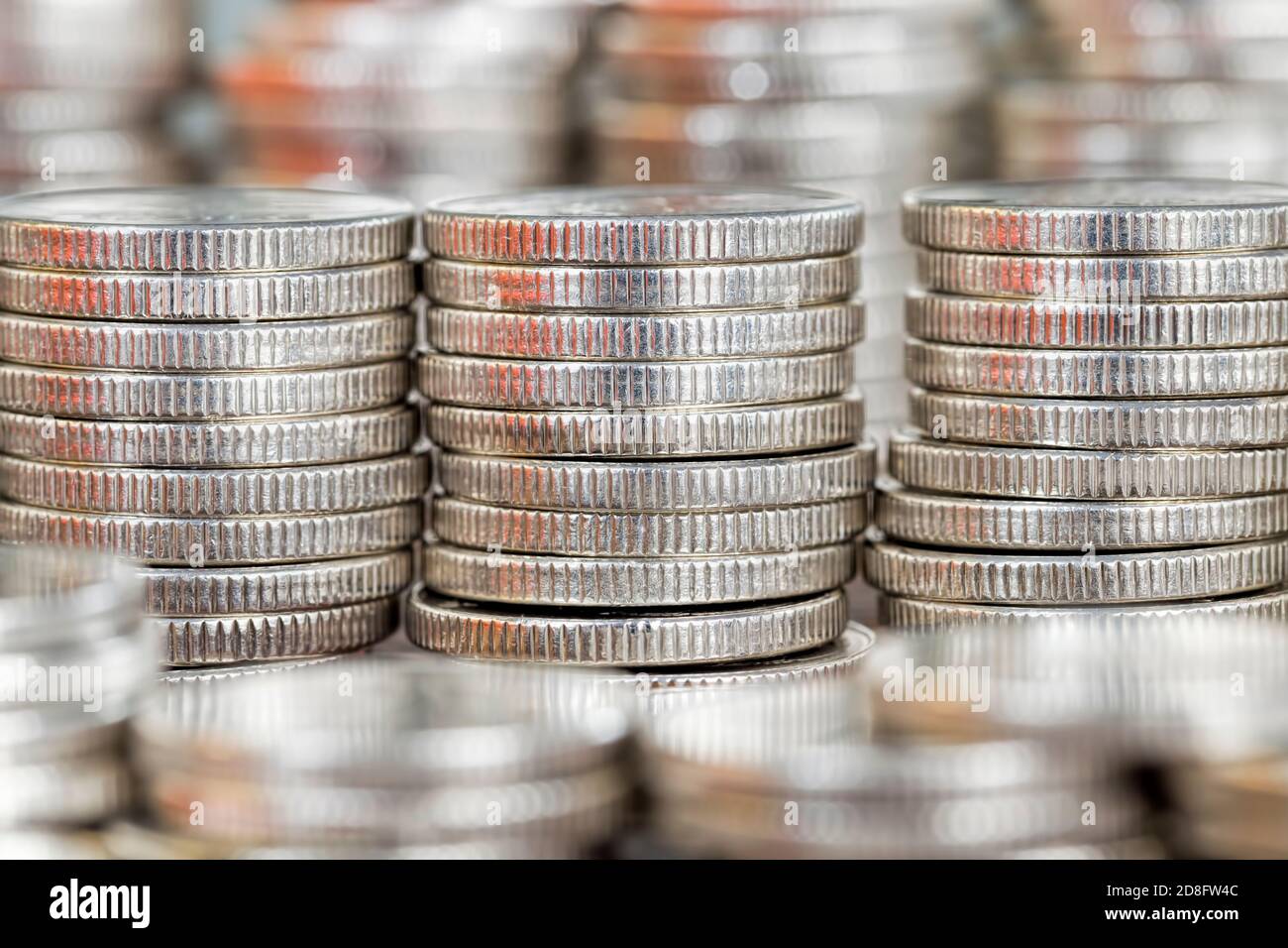 coins of silver color stacked together Stock Photo - Alamy