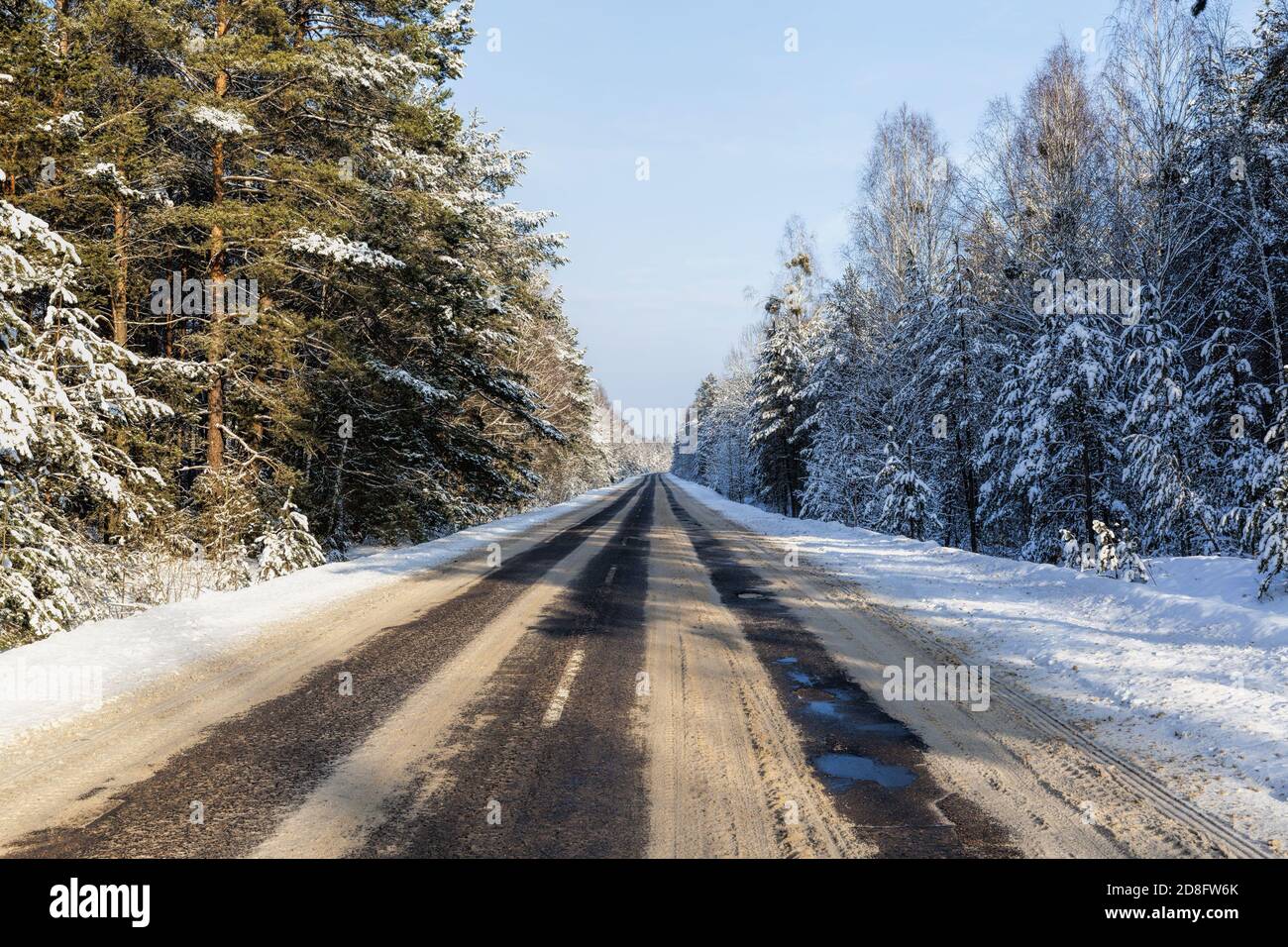 snow-covered winter road Stock Photo - Alamy