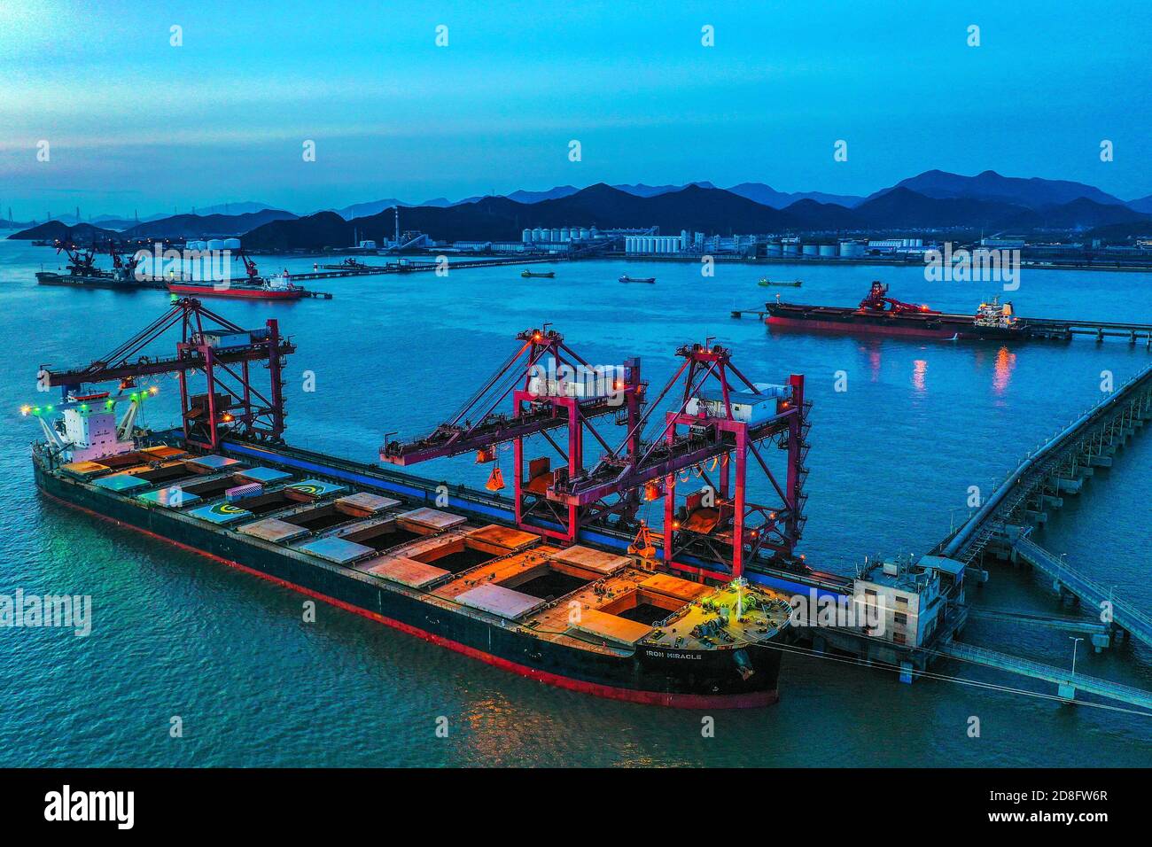 Aerial view of ships uploading and unloading containers at Zhoushan ...