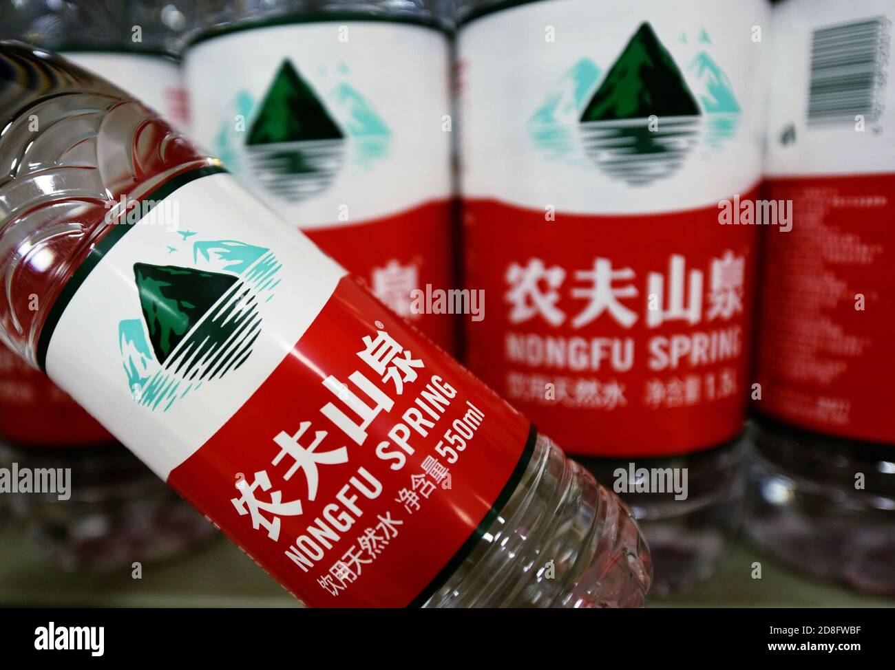 Bottles of water produced by Nongfu Spring, a Chinese bottled water and ...