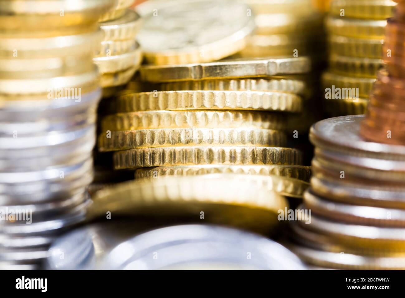 different colors and denominations of coins Stock Photo - Alamy