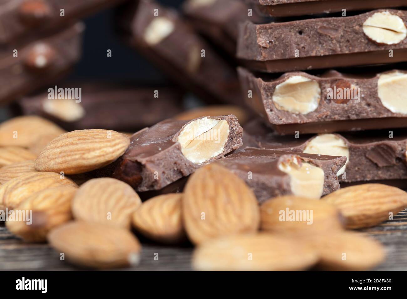 almonds and chocolate mixed in sweet chocolate Stock Photo - Alamy