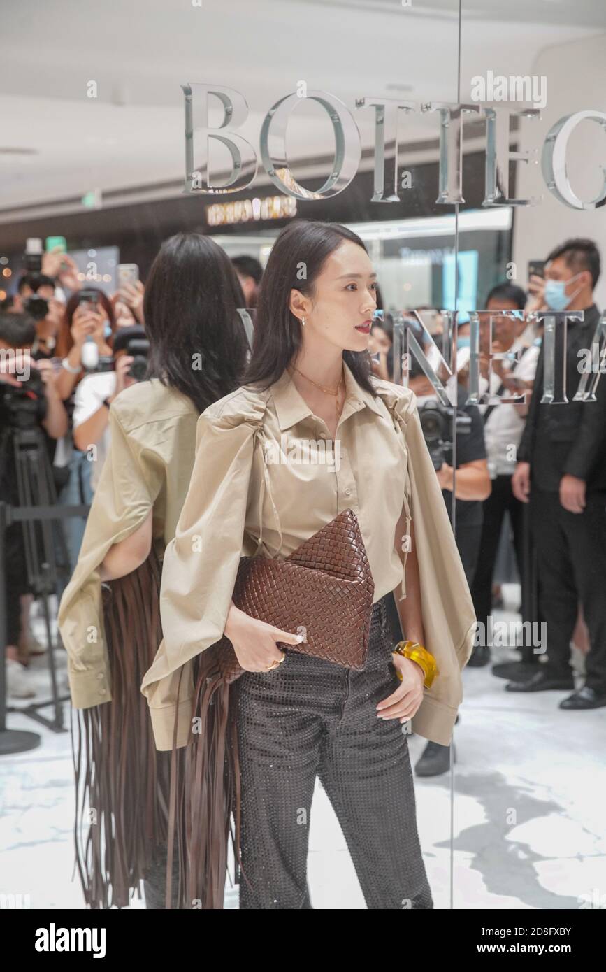 Chinese actress Tong Yao attends the opening ceremony of a new shop of ...