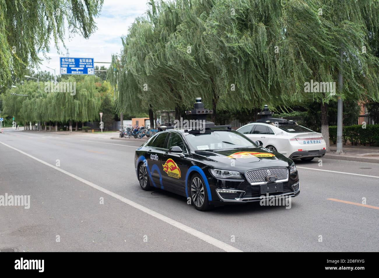 An Apollo Go Robotaxi drives on a road in Beijing, China, 10 September ...