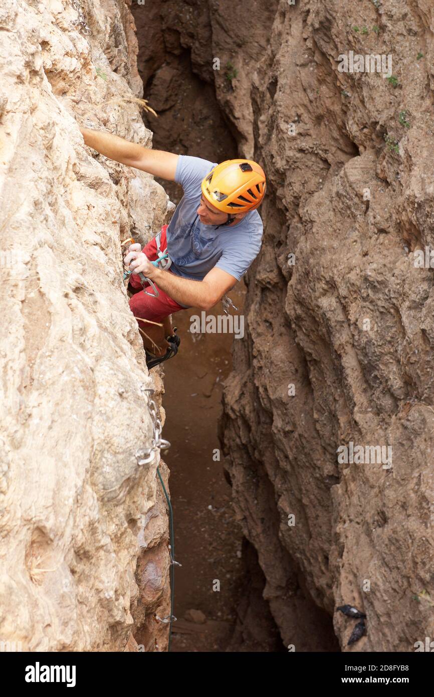 Man rock climbing Stock Photo - Alamy