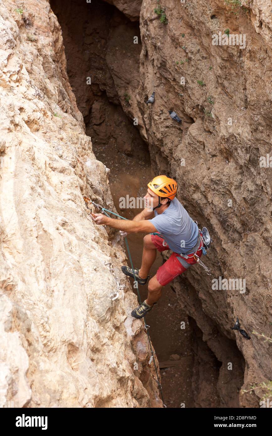 Man rock climbing Stock Photo - Alamy
