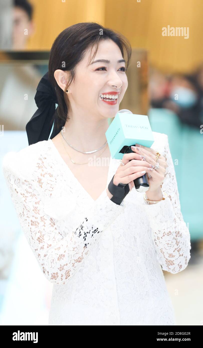 Chinese actress and singer Wan Qian shows up in white dress, showing ...