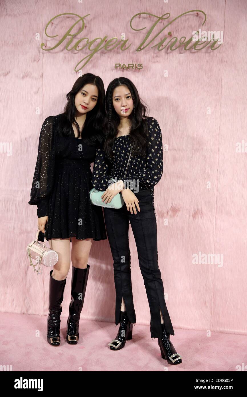 Chinese musician, actress Ouyang Nana and her sister Ouyang Didi stand for French shoes brand ...