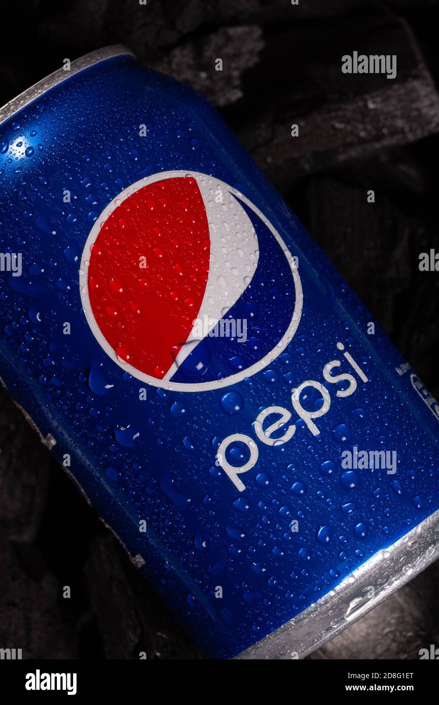 Metal can with pepsi cola on black charcoal background Stock Photo - Alamy