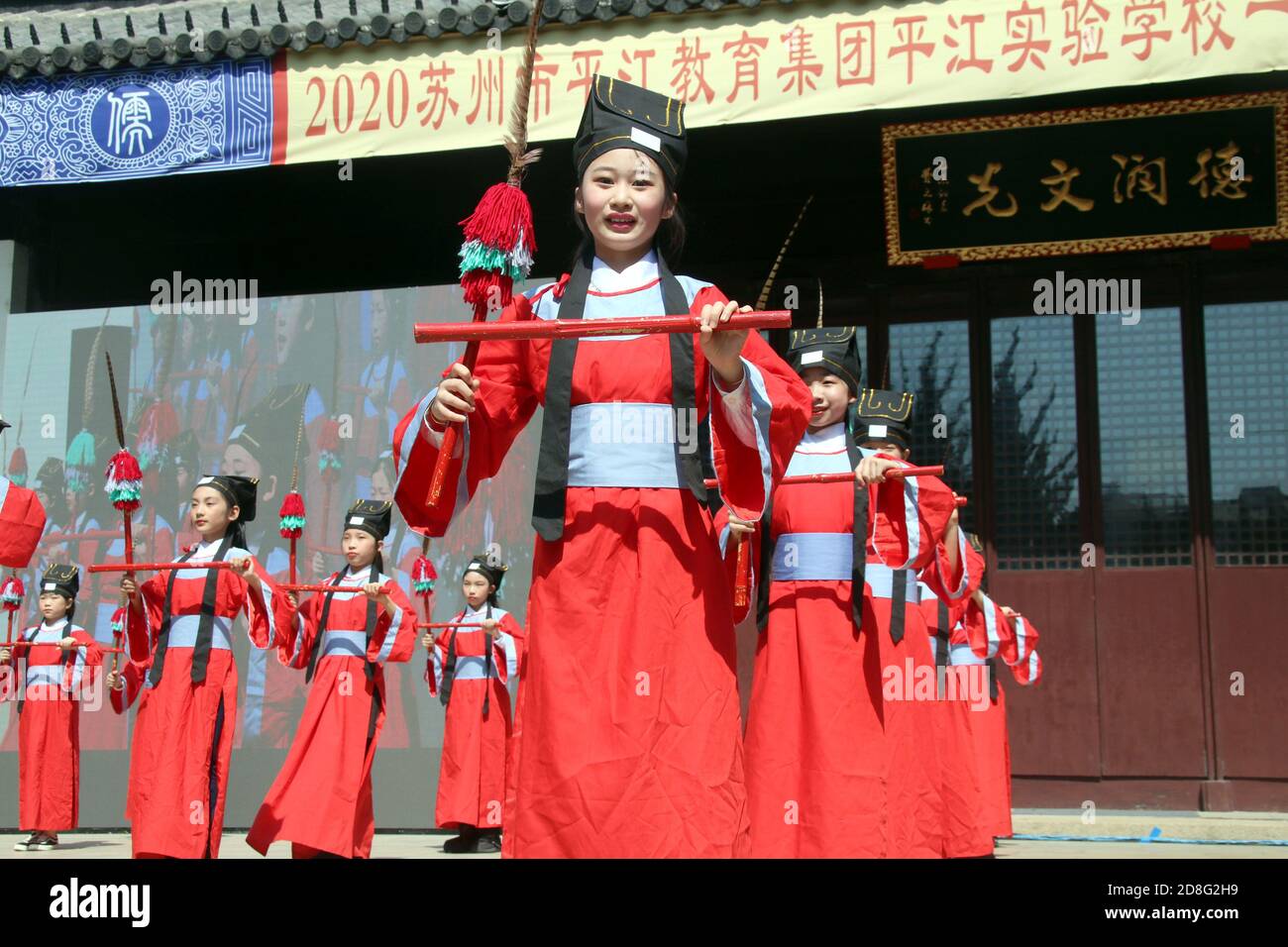 Local students perform program at a ceremony to celebrate the 2571st ...