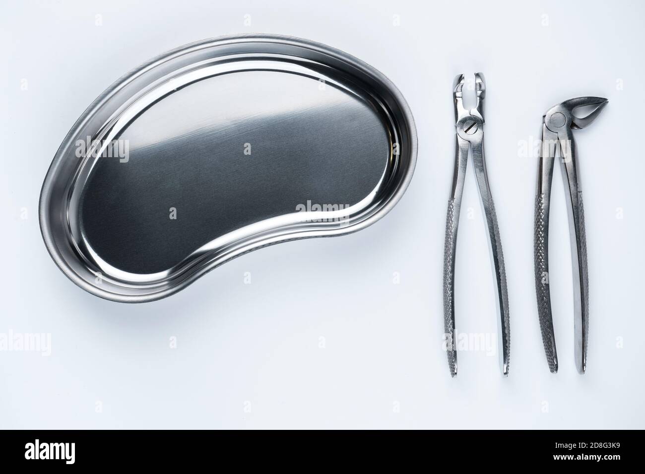 Shot of kidney-shaped bowl with dental tools Stock Photo - Alamy