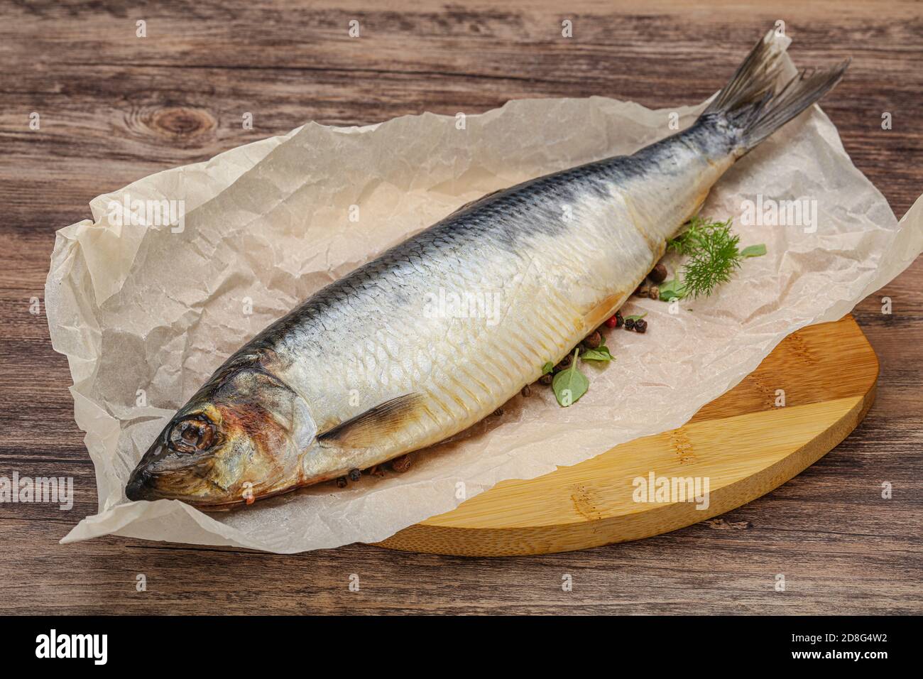 Salted Herring fish with pepper and spices Stock Photo - Alamy