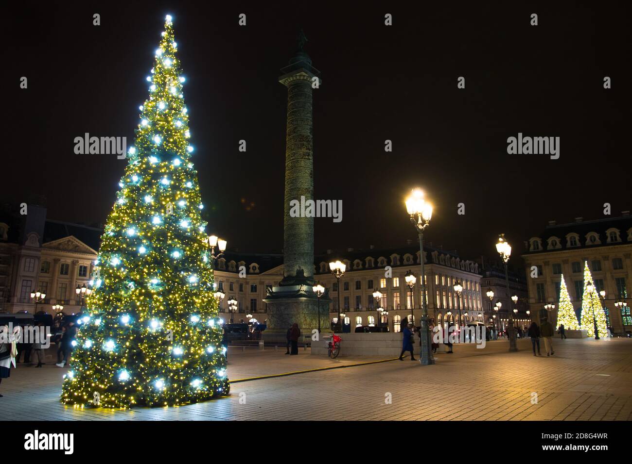 Christmas trees decorated with beautiful tinsels, Place Vendome (square ...