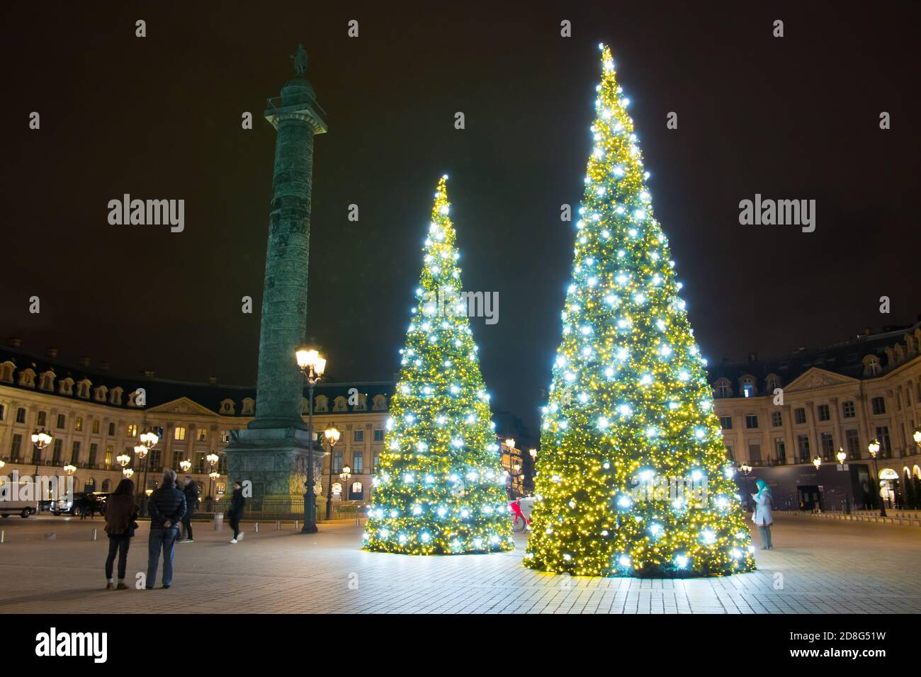 Christmas trees decorated with beautiful tinsels, Place Vendome (square ...