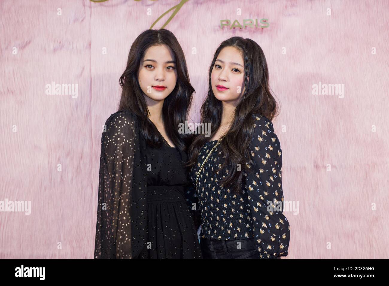 Chinese musician, actress Ouyang Nana and her sister Ouyang Didi stand for French shoes brand ...