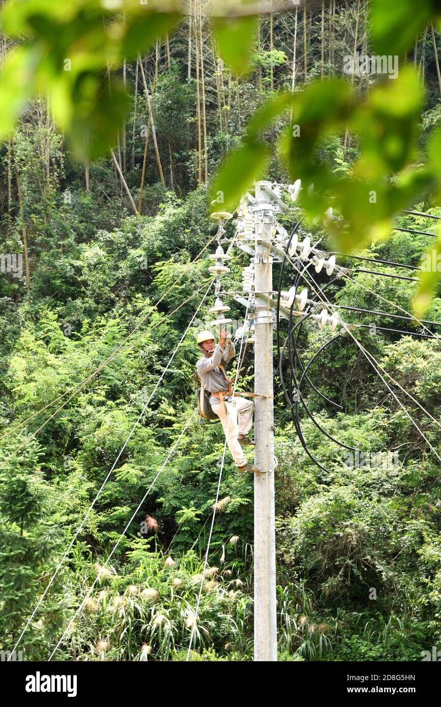 --FILE--Constructors are busy at doing electricity wiring for a poor ...