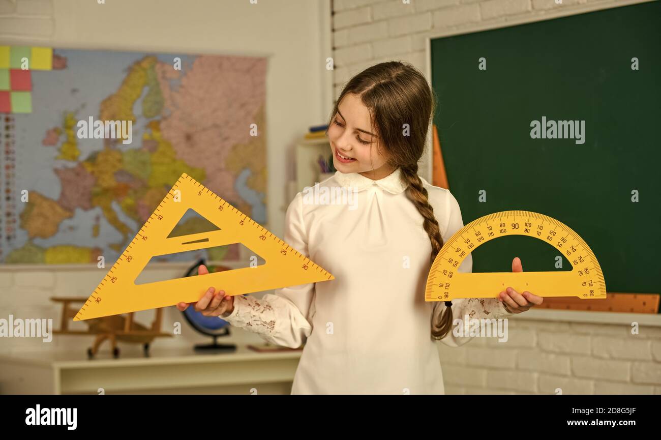 school lesson items. High school student learning geometry in class ...